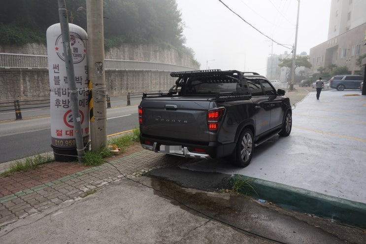 쌍용자동차 렉스턴스포츠 적재함 슬라이딩커버 거제글라스틴트 레이니블루 글라스틴트선셋 거제후방카메라 거제내비게이션 거제선팅재시공